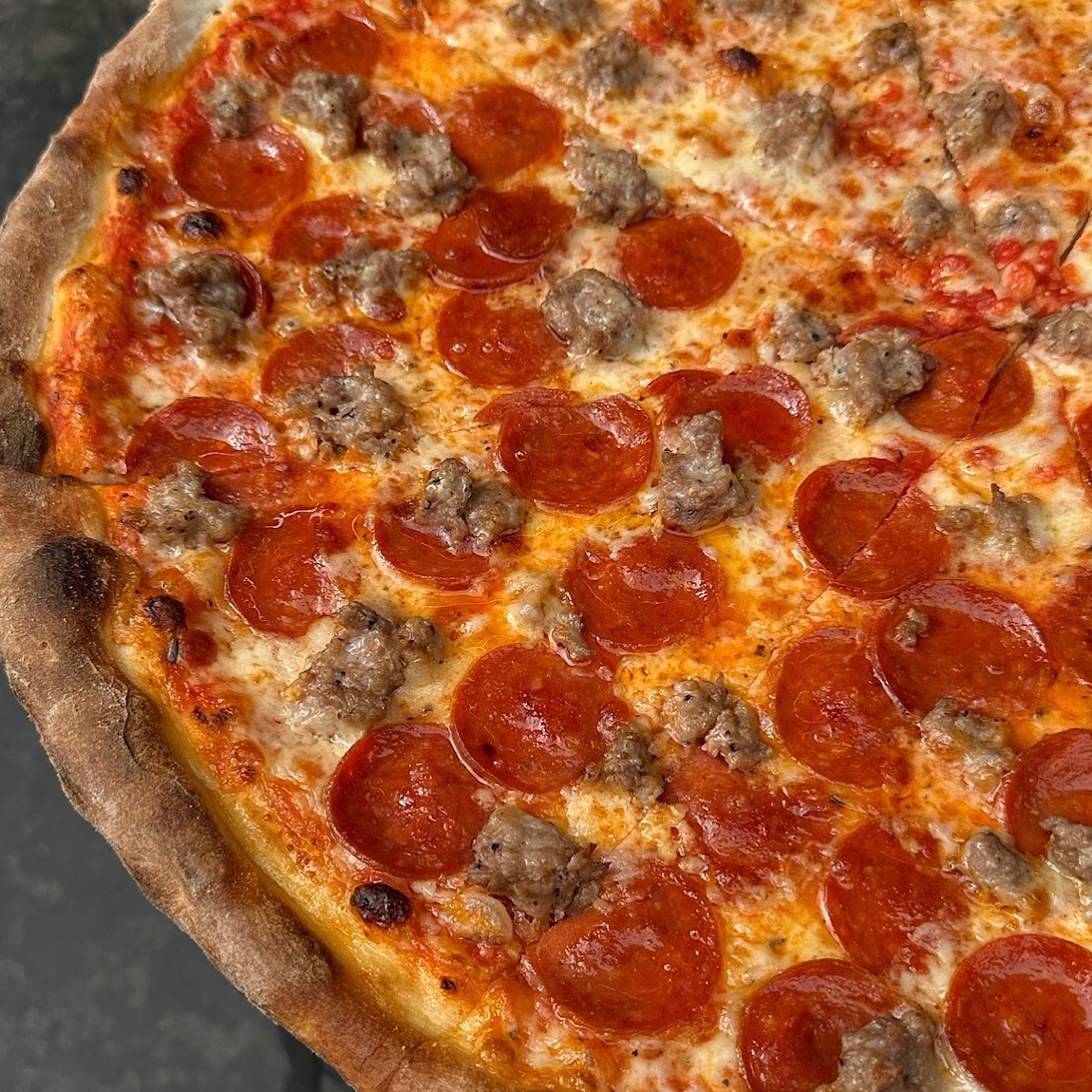 Top Rated NY Style Pizza | Hand-Tossed Slices, Pies & Squares